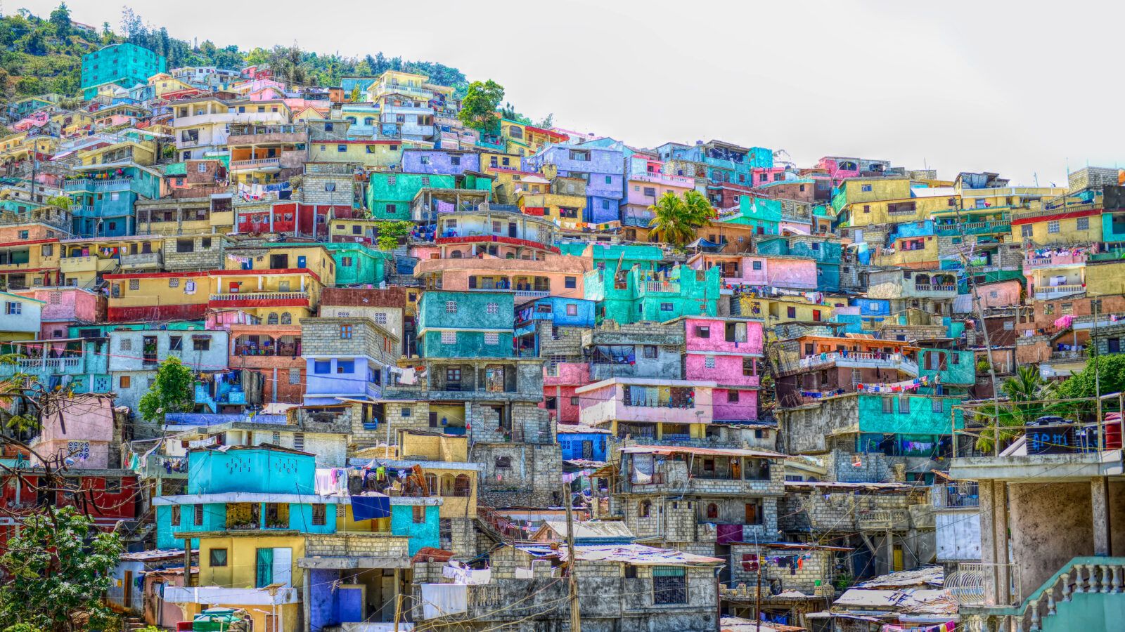 Haitian students play drums and strum guitars to escape hunger and gang ...